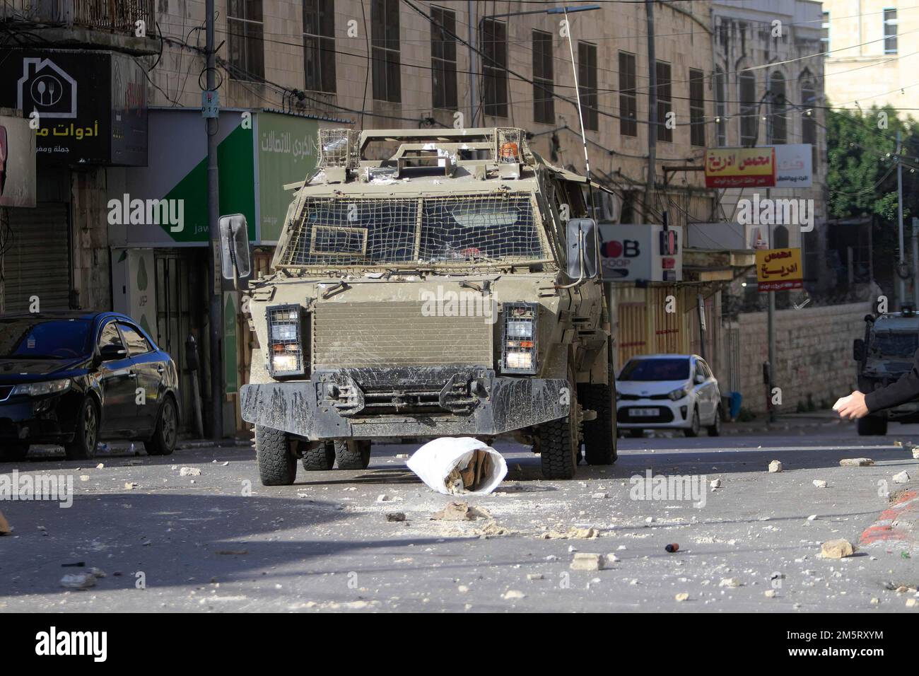 Israeli armoured vehicle take position during a raid in the old city of ...
