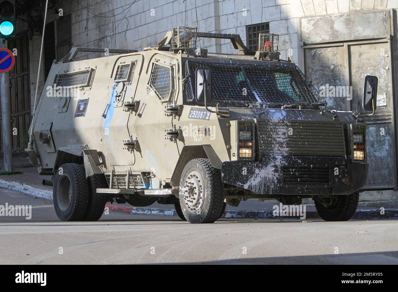 Israeli armoured vehicle take position during a raid in the old city of ...