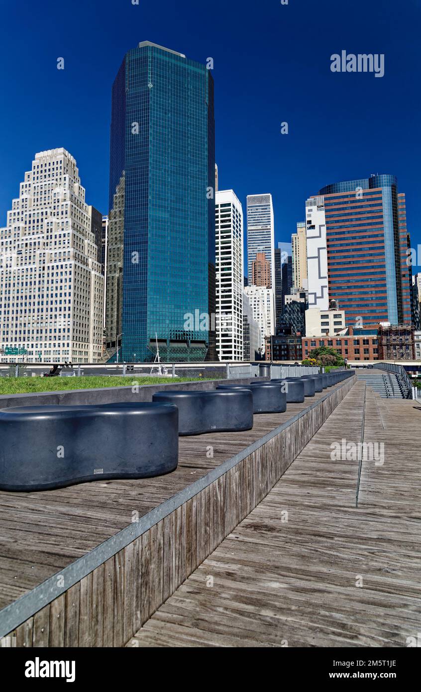 Pier 15's wood and grass, in the shadow of Manhattan's brick, steel and ...