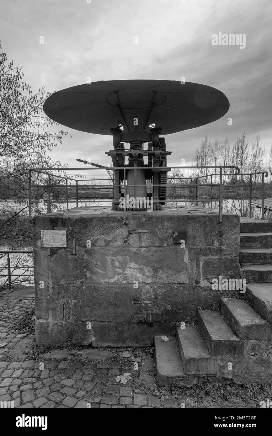 Small historical loading crane on a pedestal from 1770 at the Nidda ...