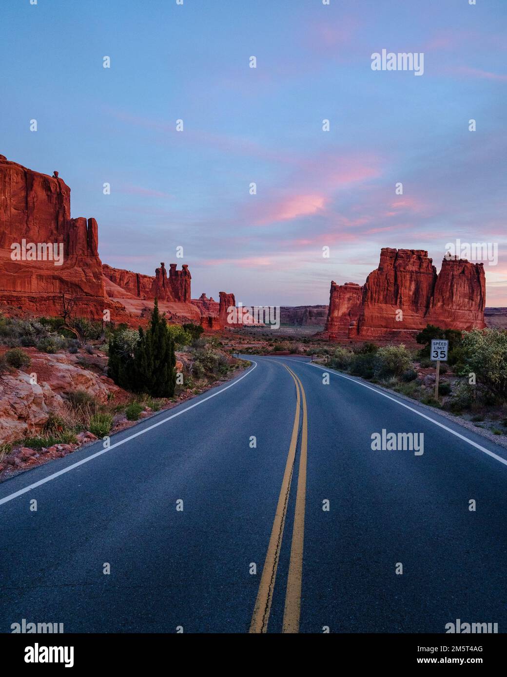 Sunset Drive through the Arches Stock Photo - Alamy