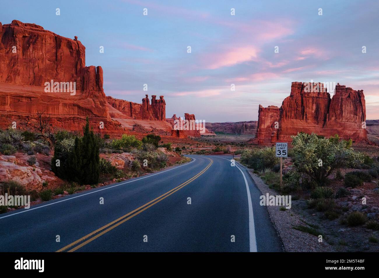 Sunset Drive through the Arches Stock Photo - Alamy