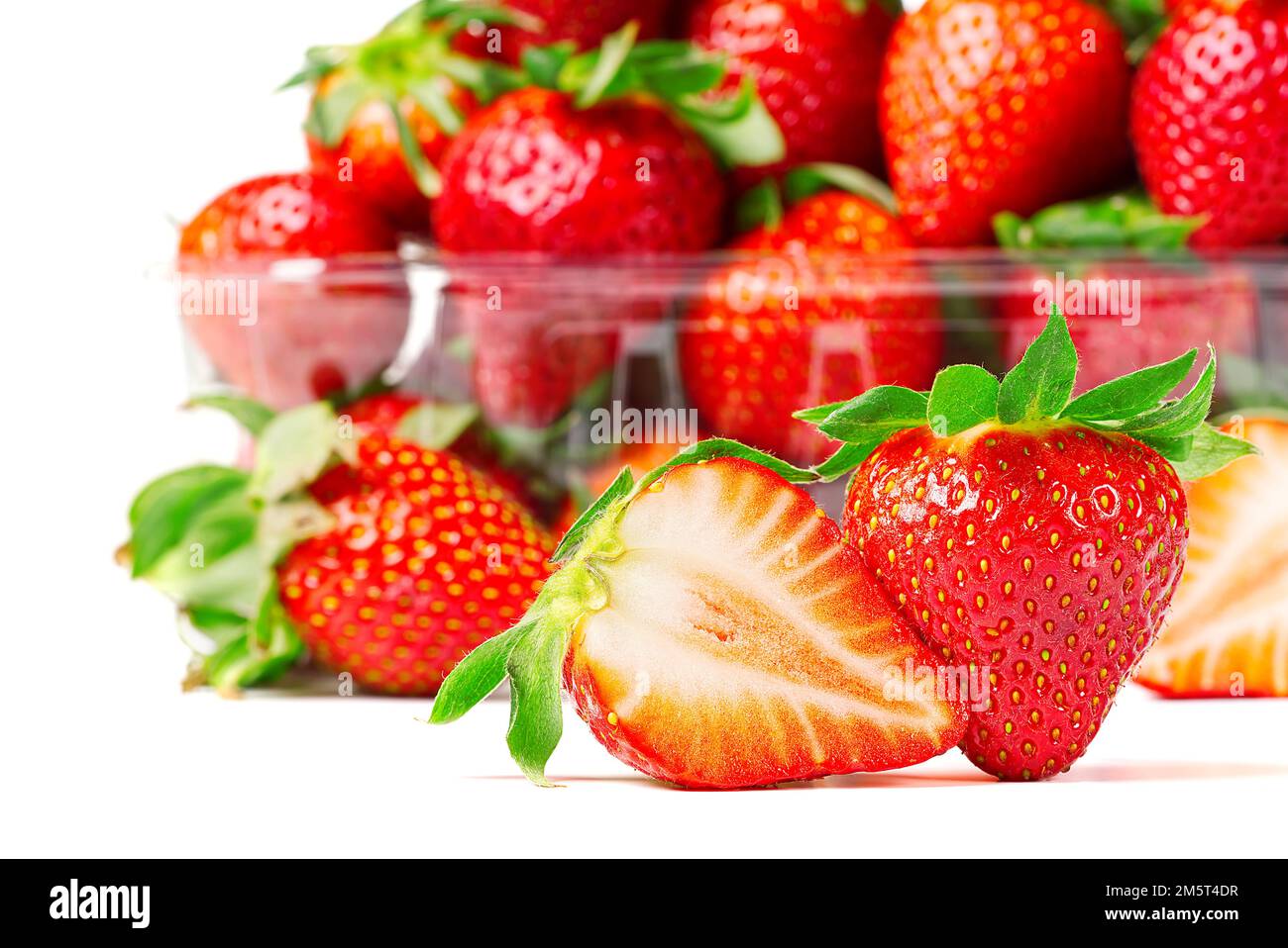 Fresh juicy sweet strawberies isolated on white Stock Photo - Alamy