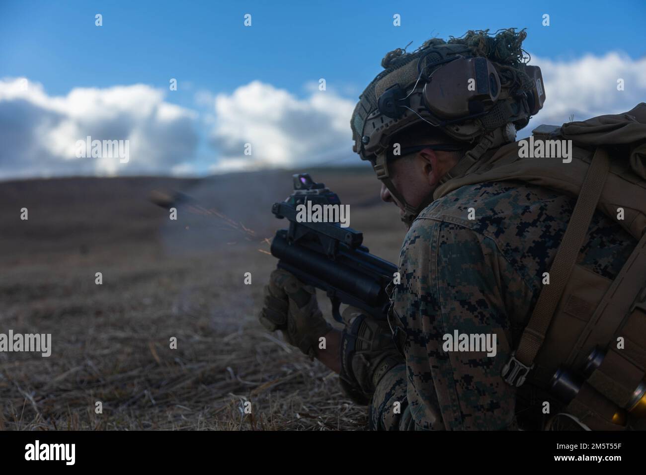 A U.S. Marine with 1st Battalion, 2d Marines fires an M320 grenade ...