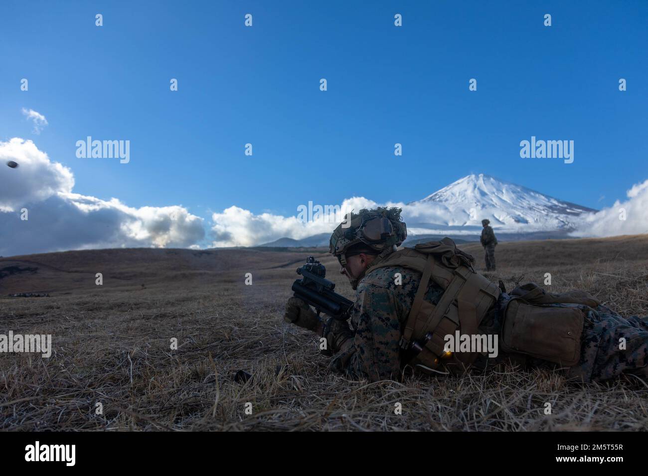 A U.S. Marine with 1st Battalion, 2d Marines fires an M320 grenade ...