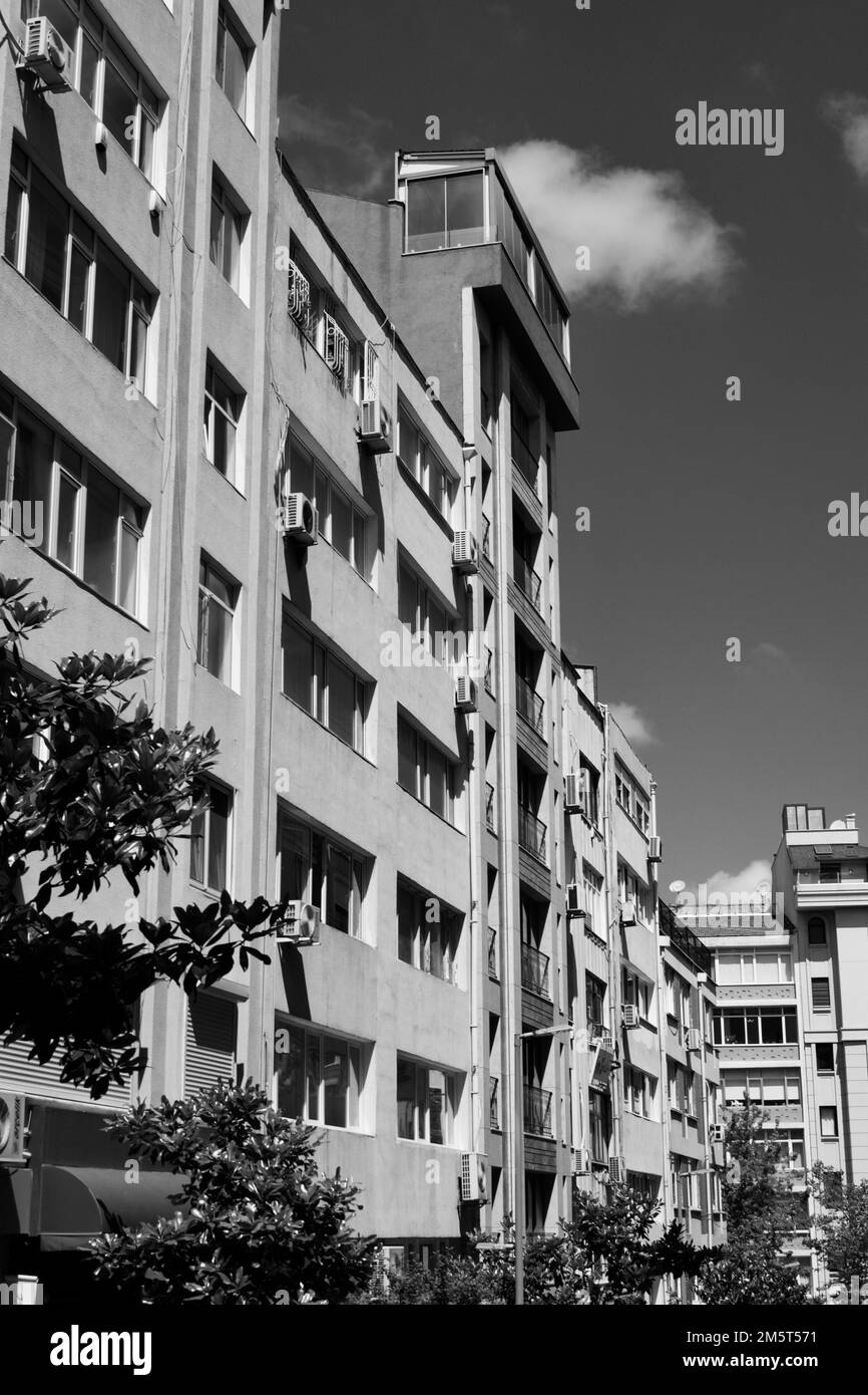 A vertical greyscale shot of an old residential building Stock Photo ...