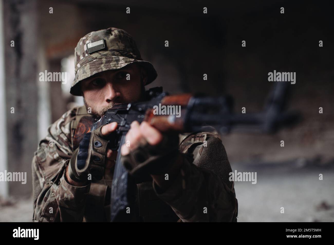 The Ukrainian military is defending its positions. Soldier in war, with ...