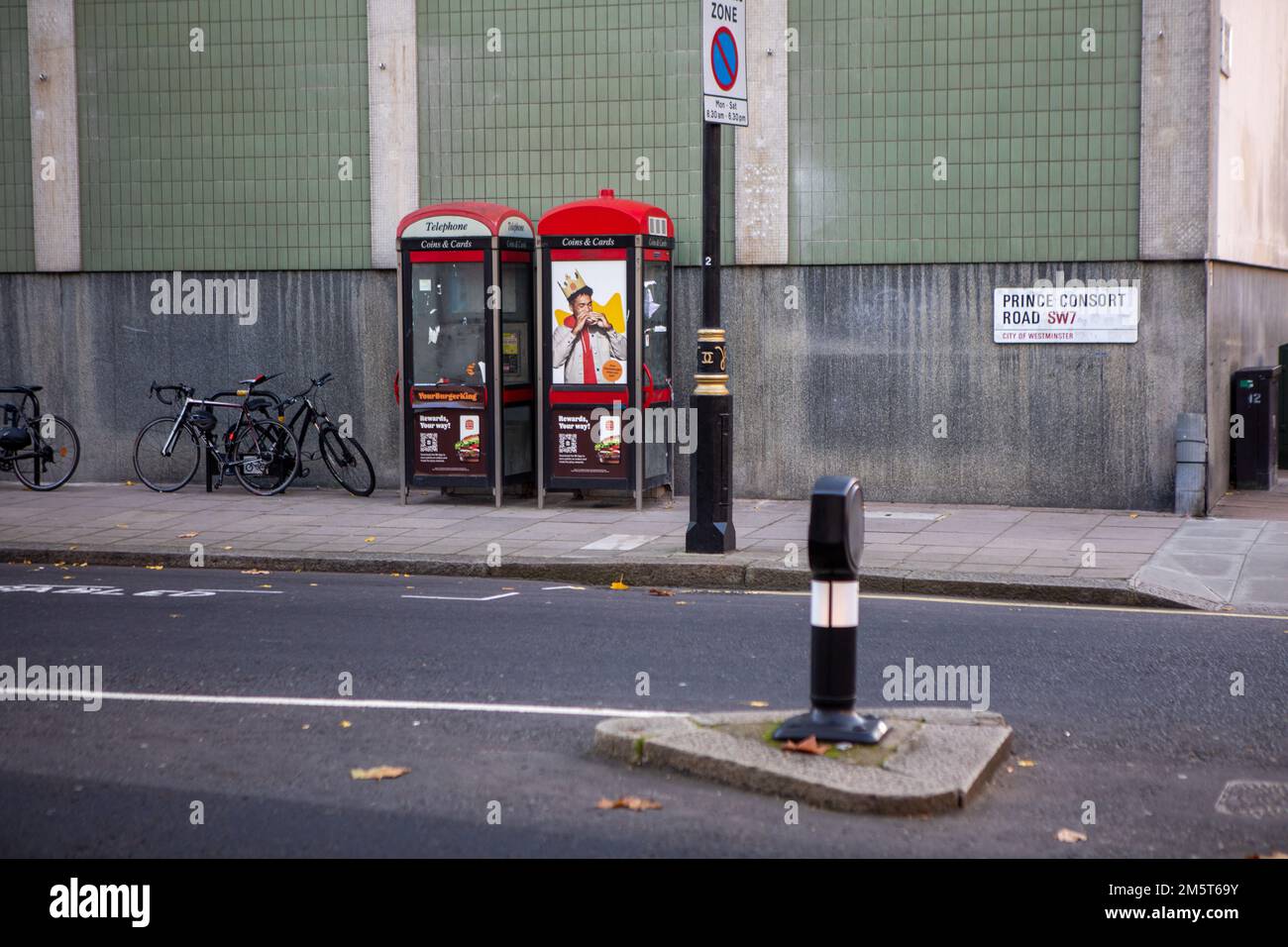 London, England – December 2022. semi modern, retro red phone booth ...