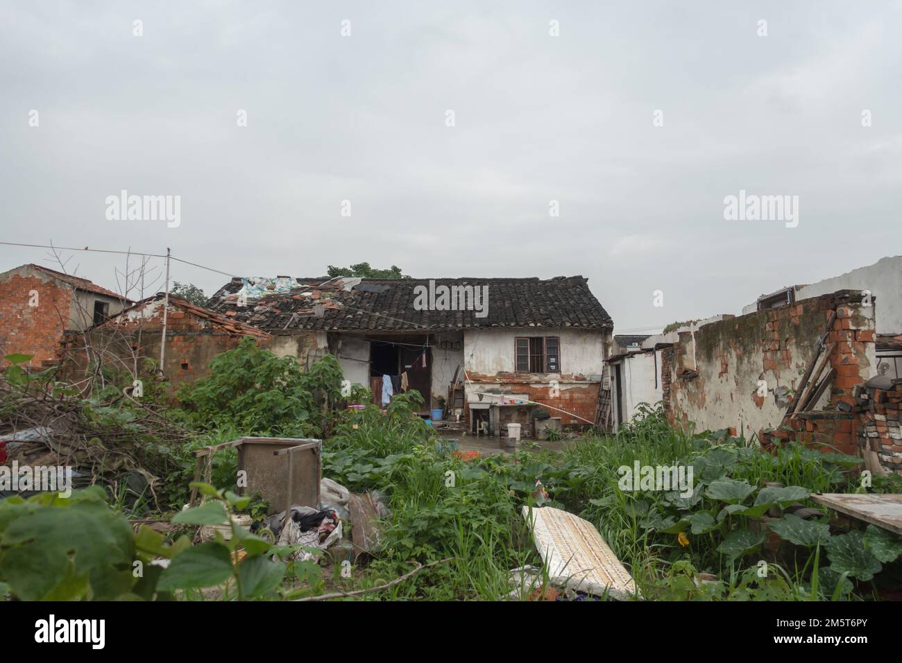 An outdoor view of ruined and abandoned houses in an old village Stock ...