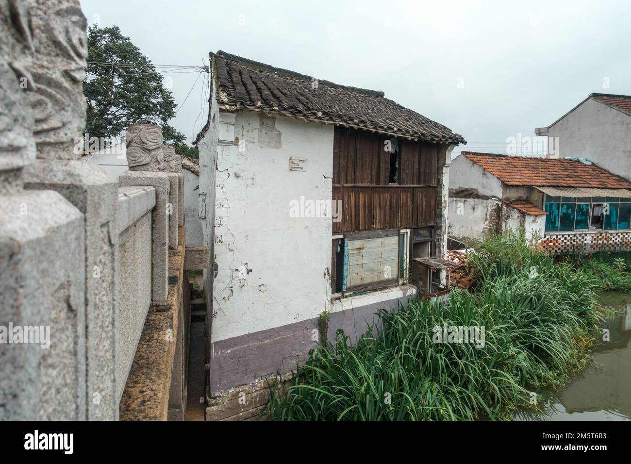 An outdoor view of ruined and abandoned houses in an old village Stock ...