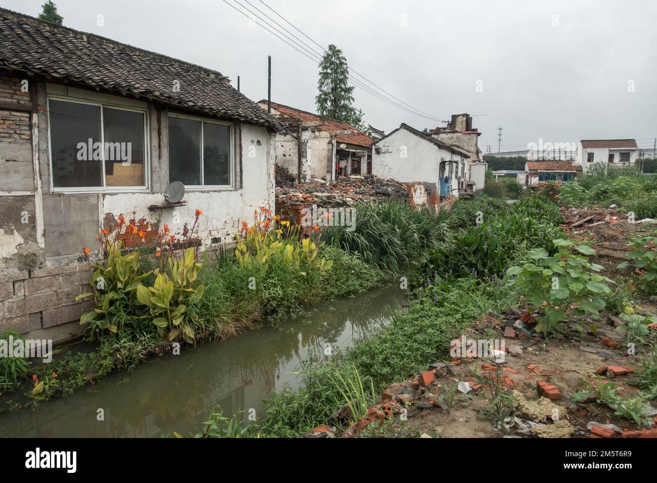 An outdoor view of ruined and abandoned houses in an old village Stock ...