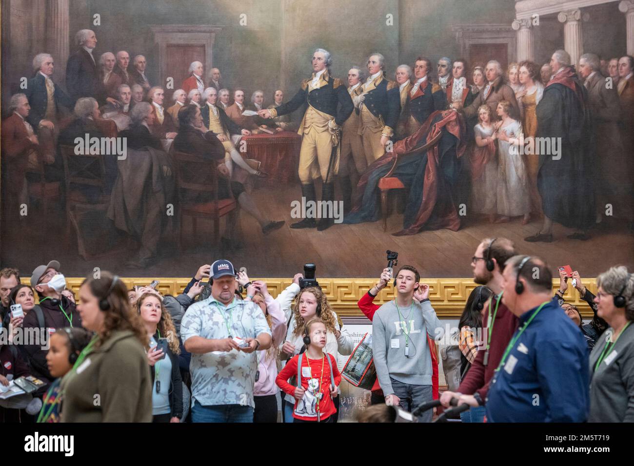 Washington DC, USA. 30th Dec, 2022. Tourists stand under a painting ...