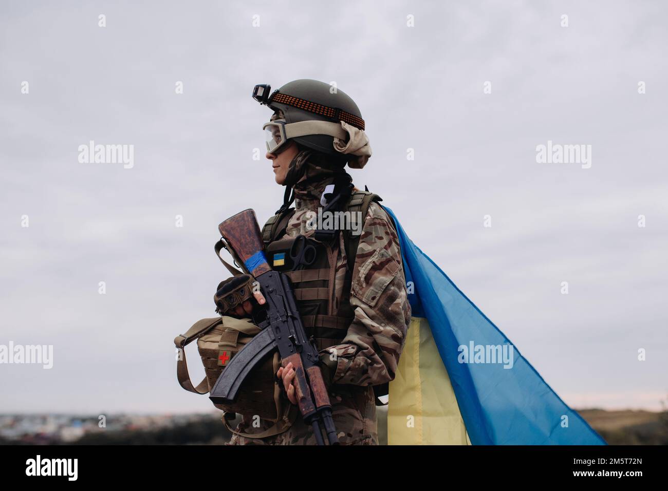 Ukrainian woman defender in the war. Portrait of a military woman with ...