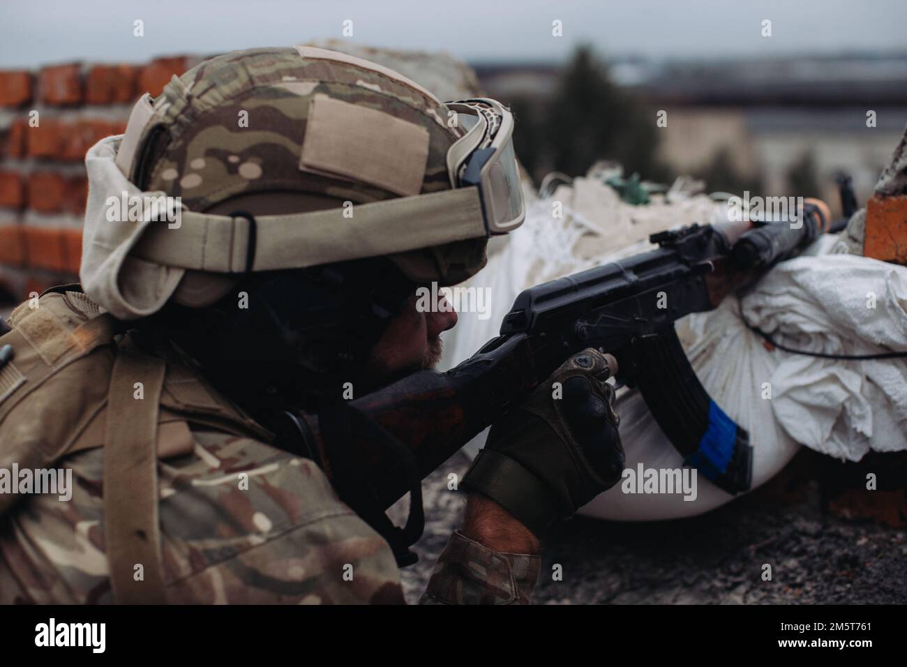 The Ukrainian military is defending its positions. Soldier in war, with ...