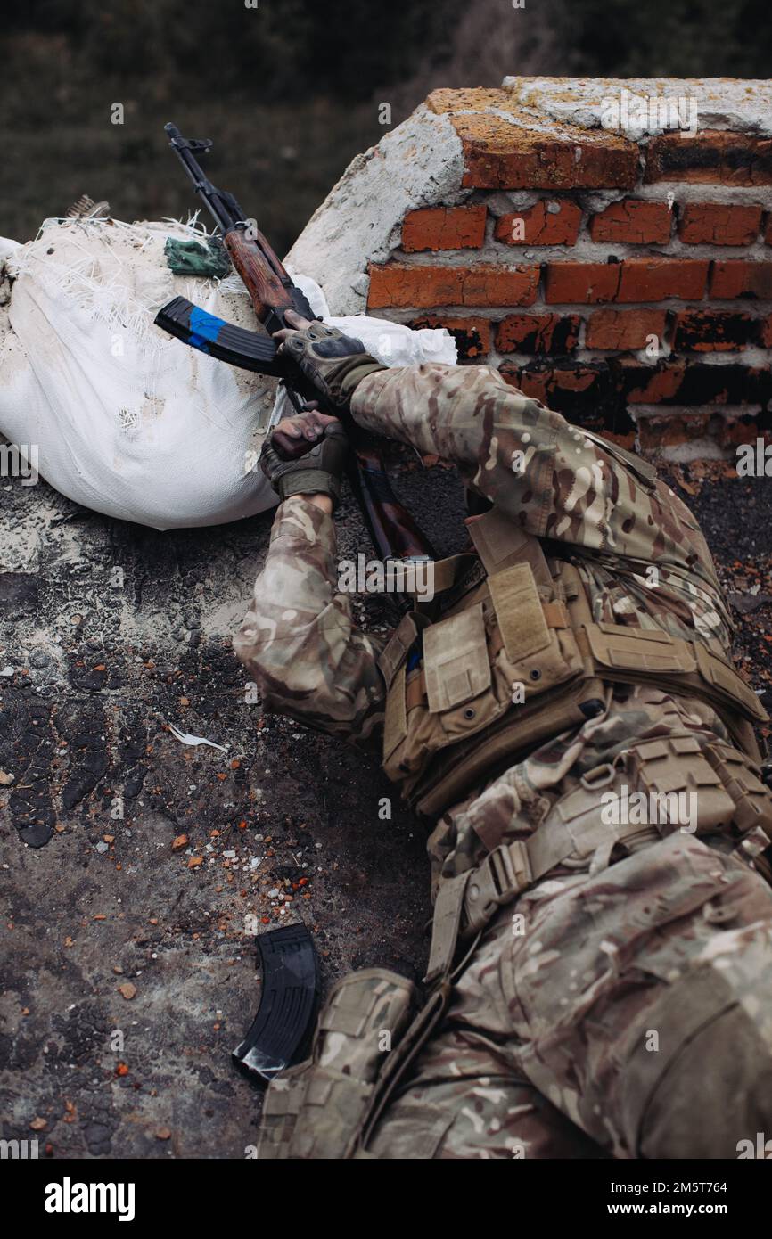 The Ukrainian military is defending its positions. Soldier in war, with ...