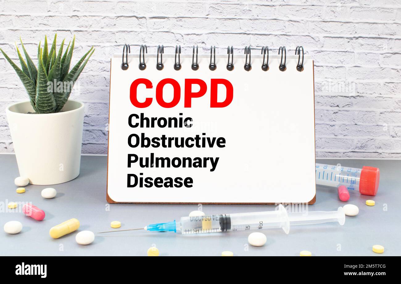 COPD concept photo with nasal cannula, pills, vials, and syringe Stock ...