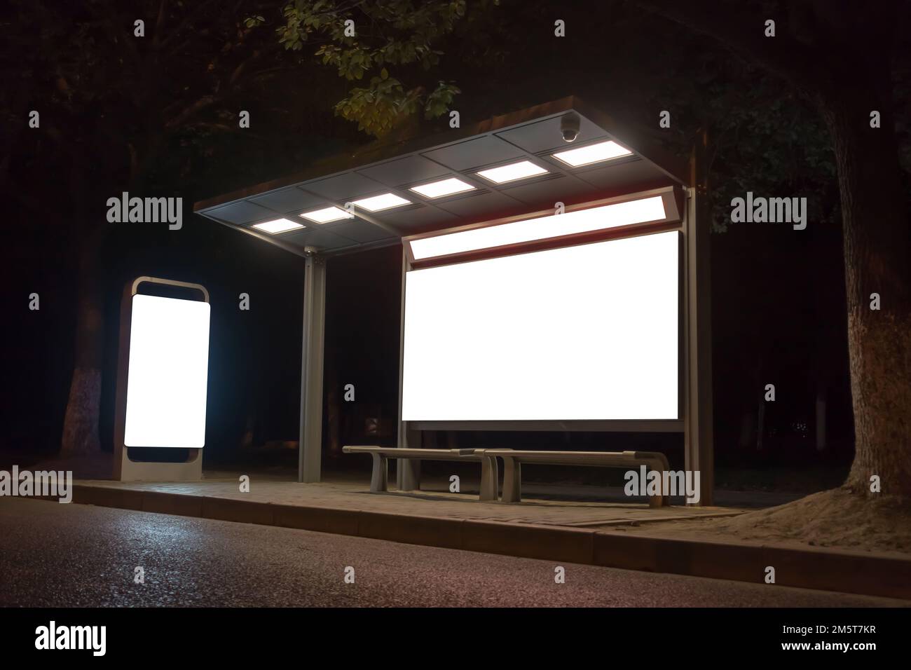 An empty white signboard in a street at night with copy space Stock ...
