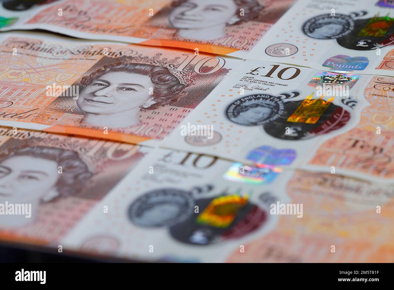 Uk orange banknotes hi-res stock photography and images - Alamy