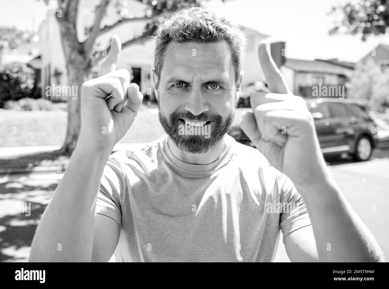 cheerful unshaven guy inspired with idea, inspiration Stock Photo - Alamy