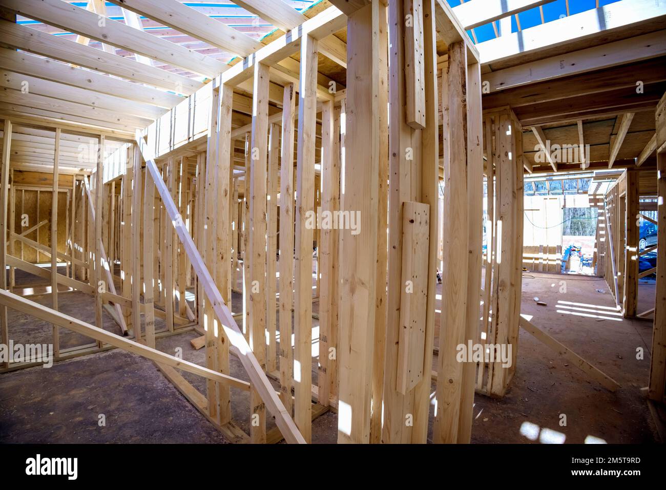 Frame beams stick framework an interior of new house that is in process ...