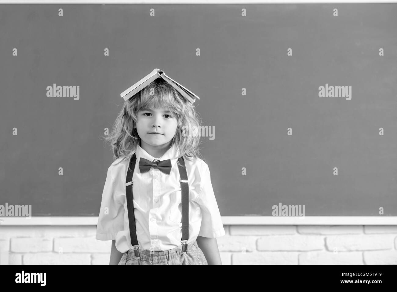 back to school. knowledge day. concept of education. nerd kid with long ...