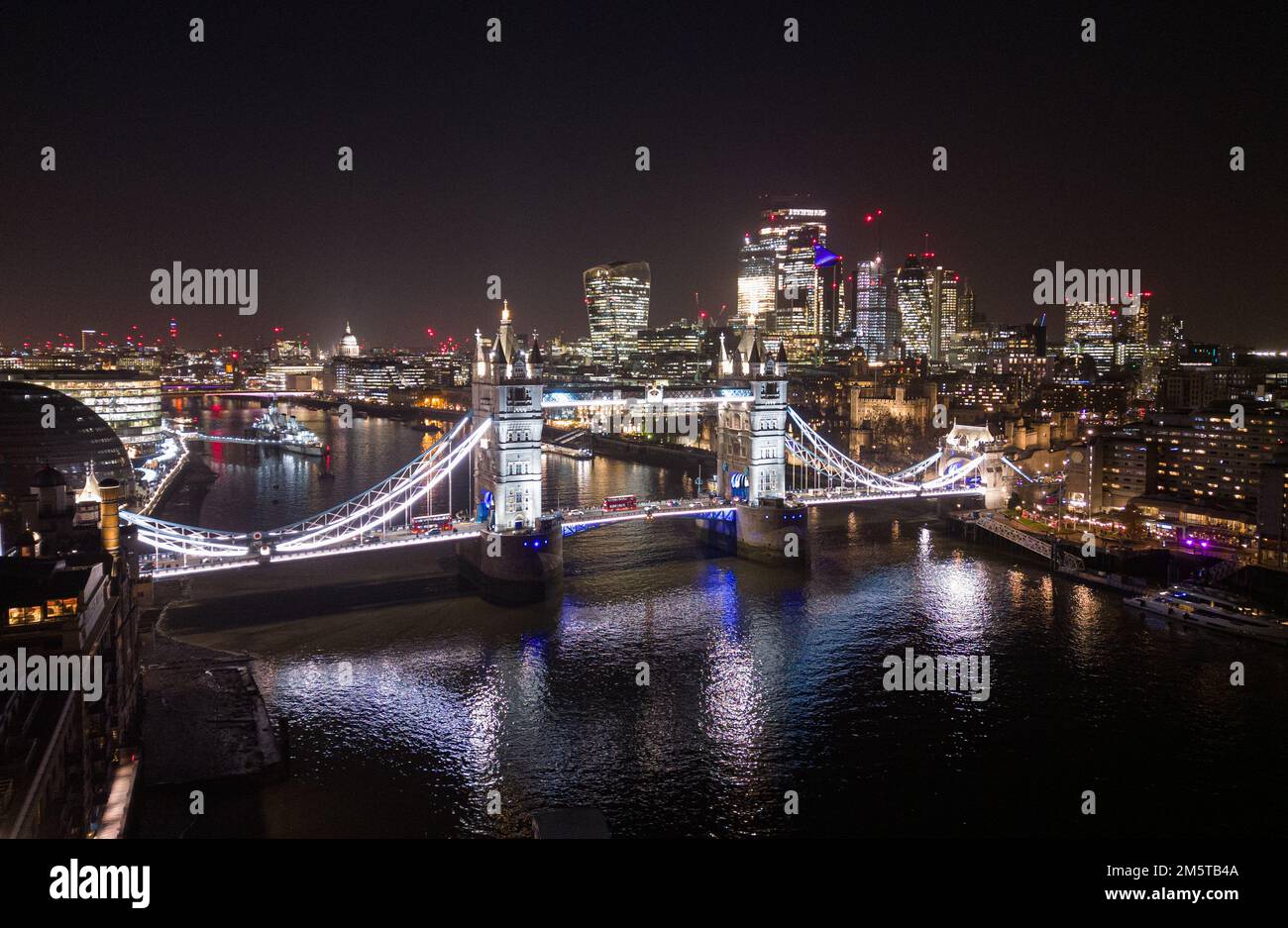 London Tower Bridge and City of London by night - amazing aerial view ...
