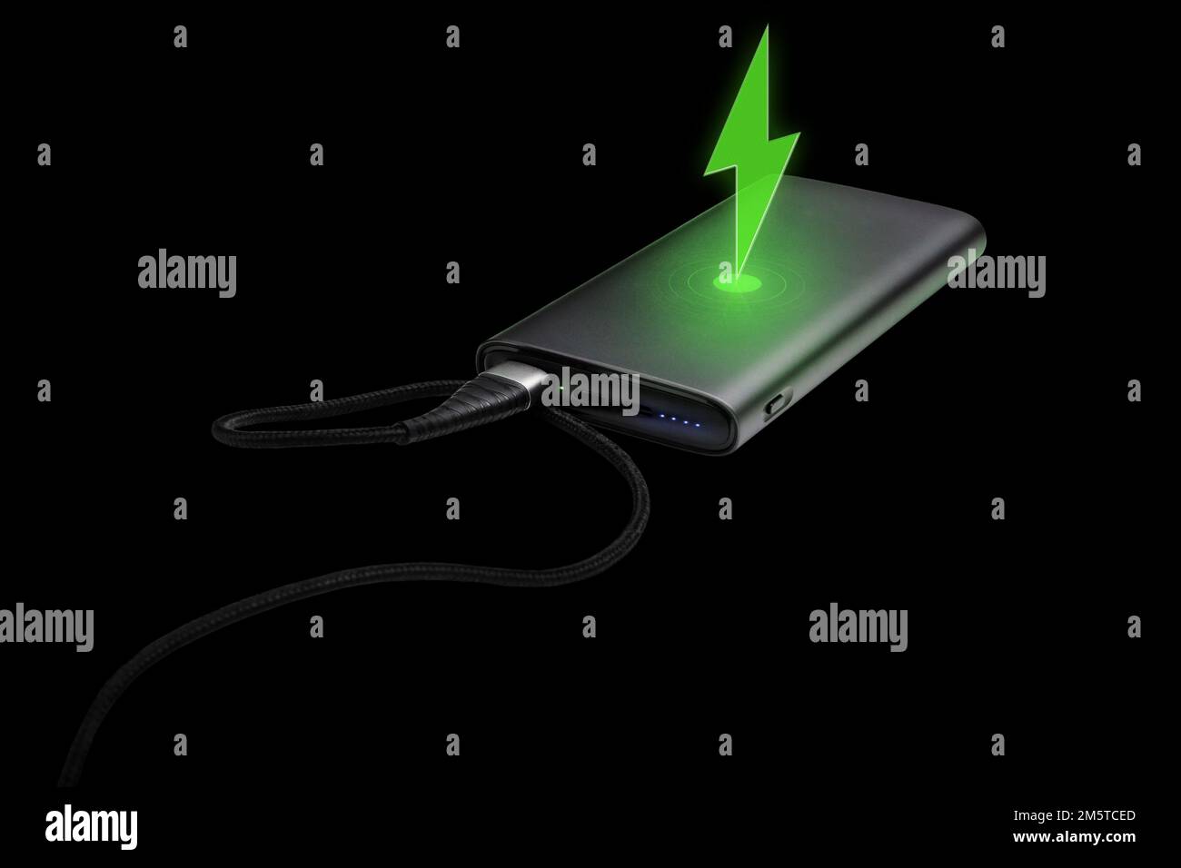 Fully charged portable powerbank with cable and two usb outputs ...