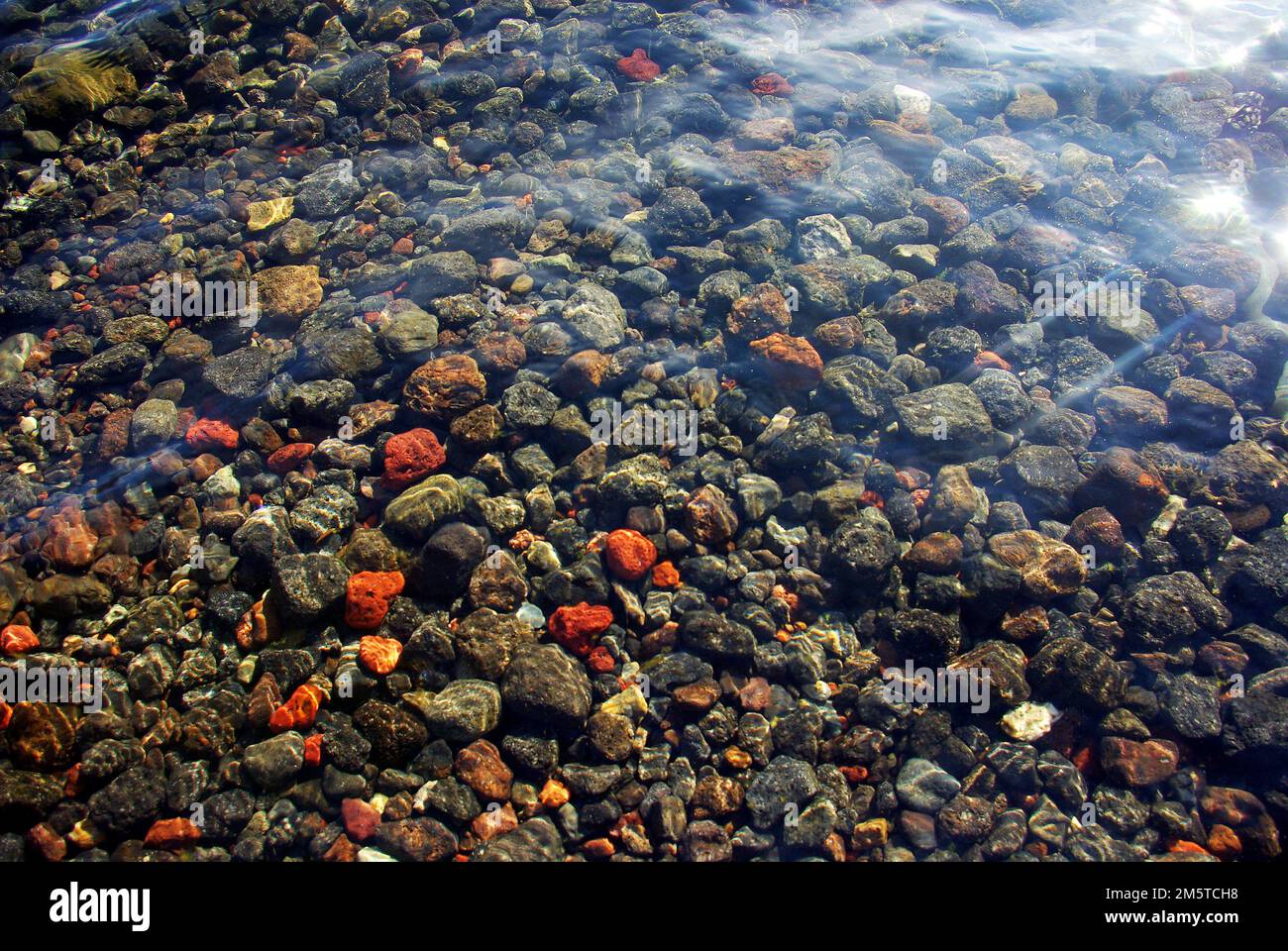 Stones in lake chuzenji, Nikko Stock Photo - Alamy