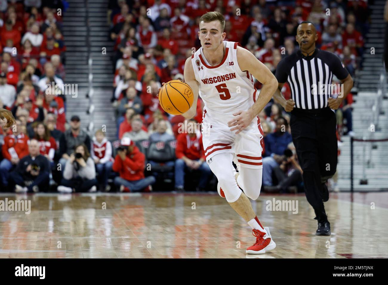 Madison, WI, USA. 30th Dec, 2022. Wisconsin Badgers forward Tyler Wahl ...