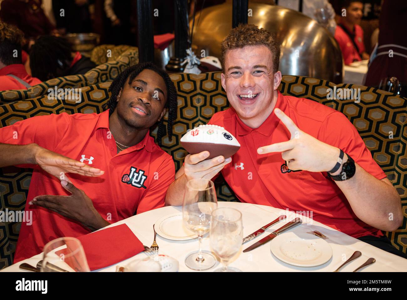 Utah Utes quarterback Nate Johnson (left) and Utah Utes offensive ...