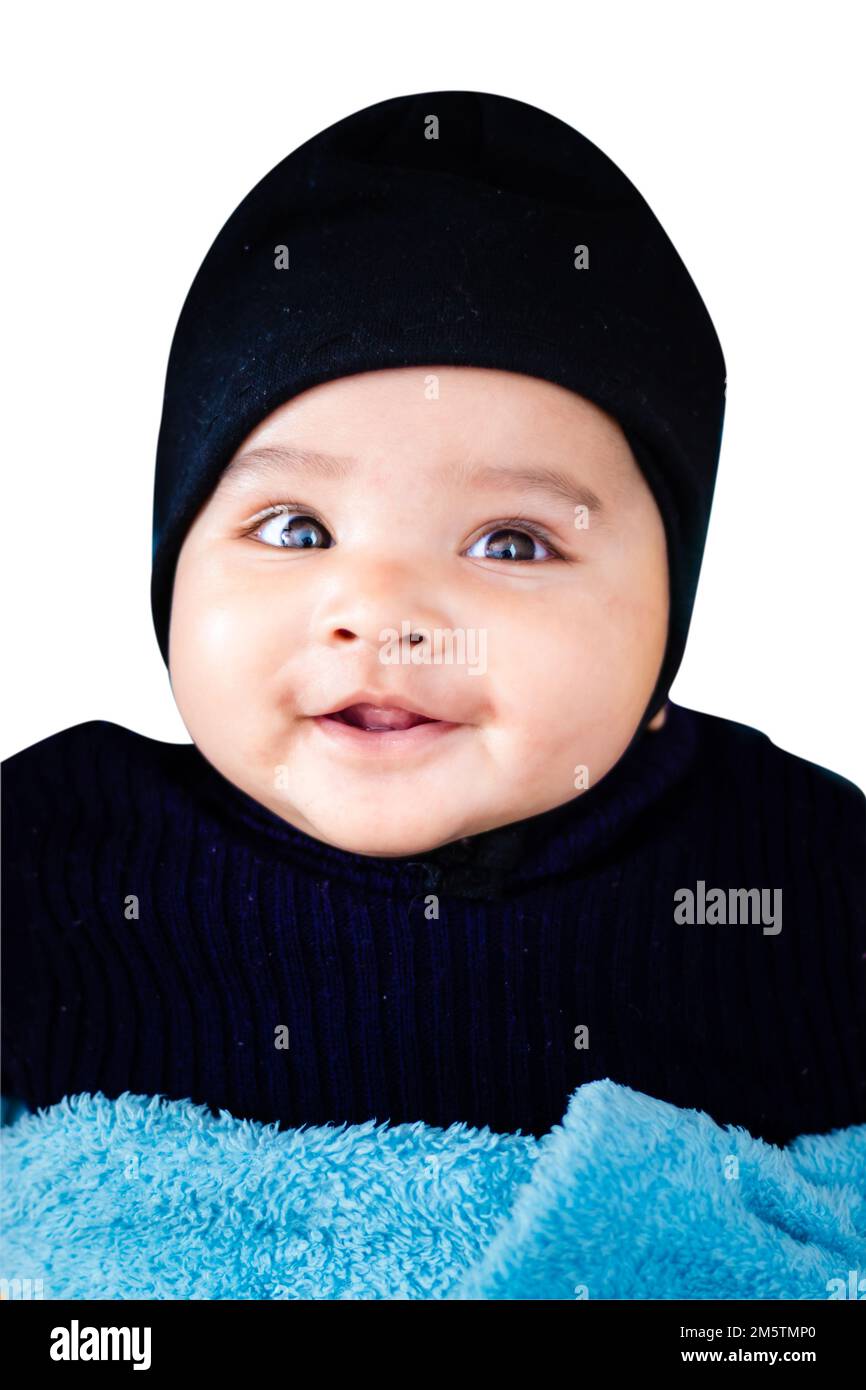 infant boy in black outfit lying cute facial expression at indoor from ...