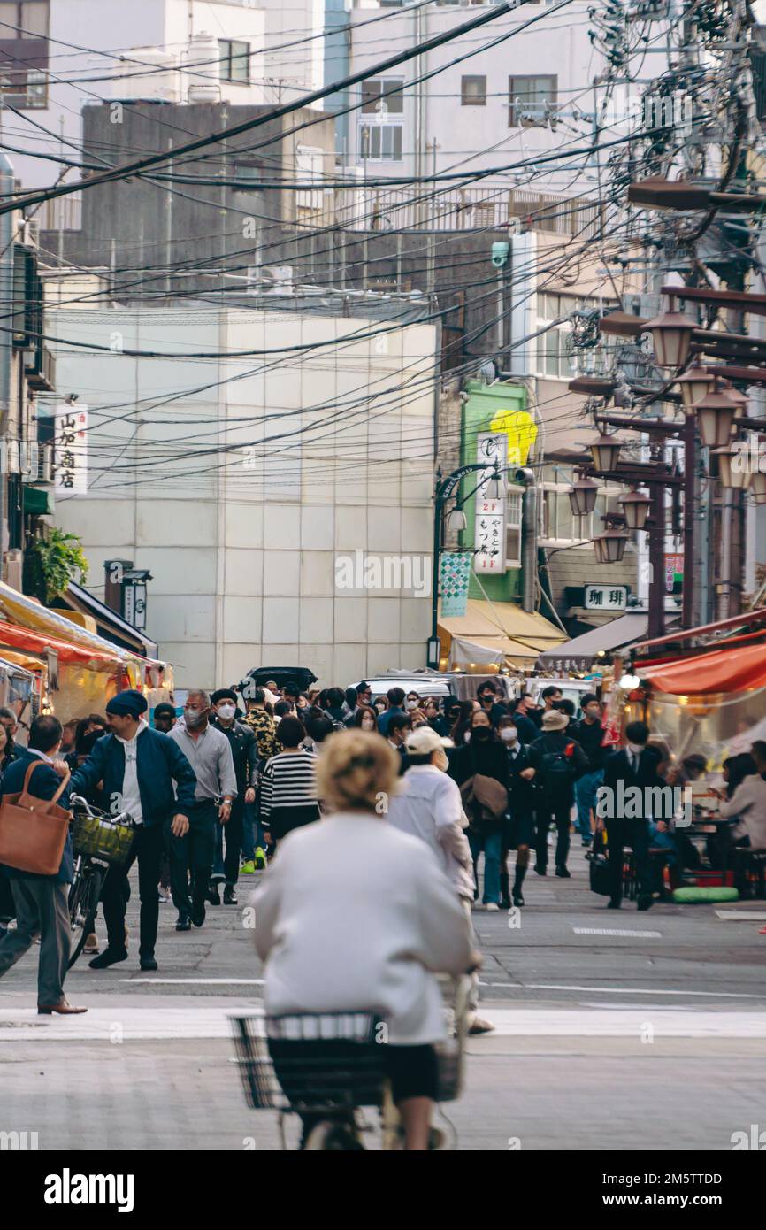 crowds of people on the streets of downtown Tokyo Stock Photo - Alamy