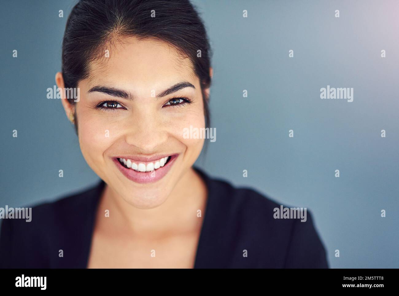 Confidence is the key to success. Studio portrait of an attractive ...