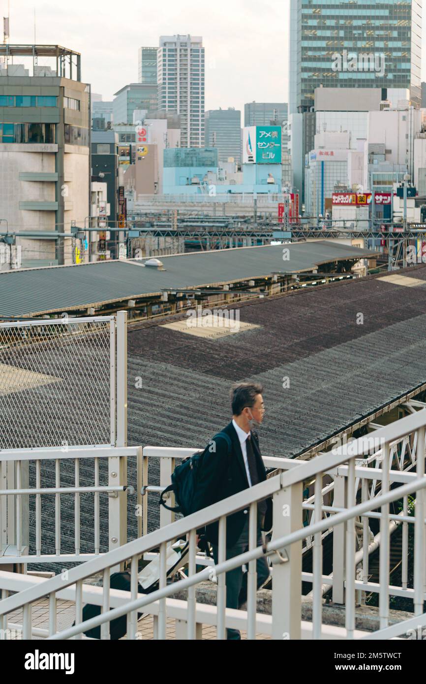 Japanese people and the cityscape of Tokyo Stock Photo - Alamy