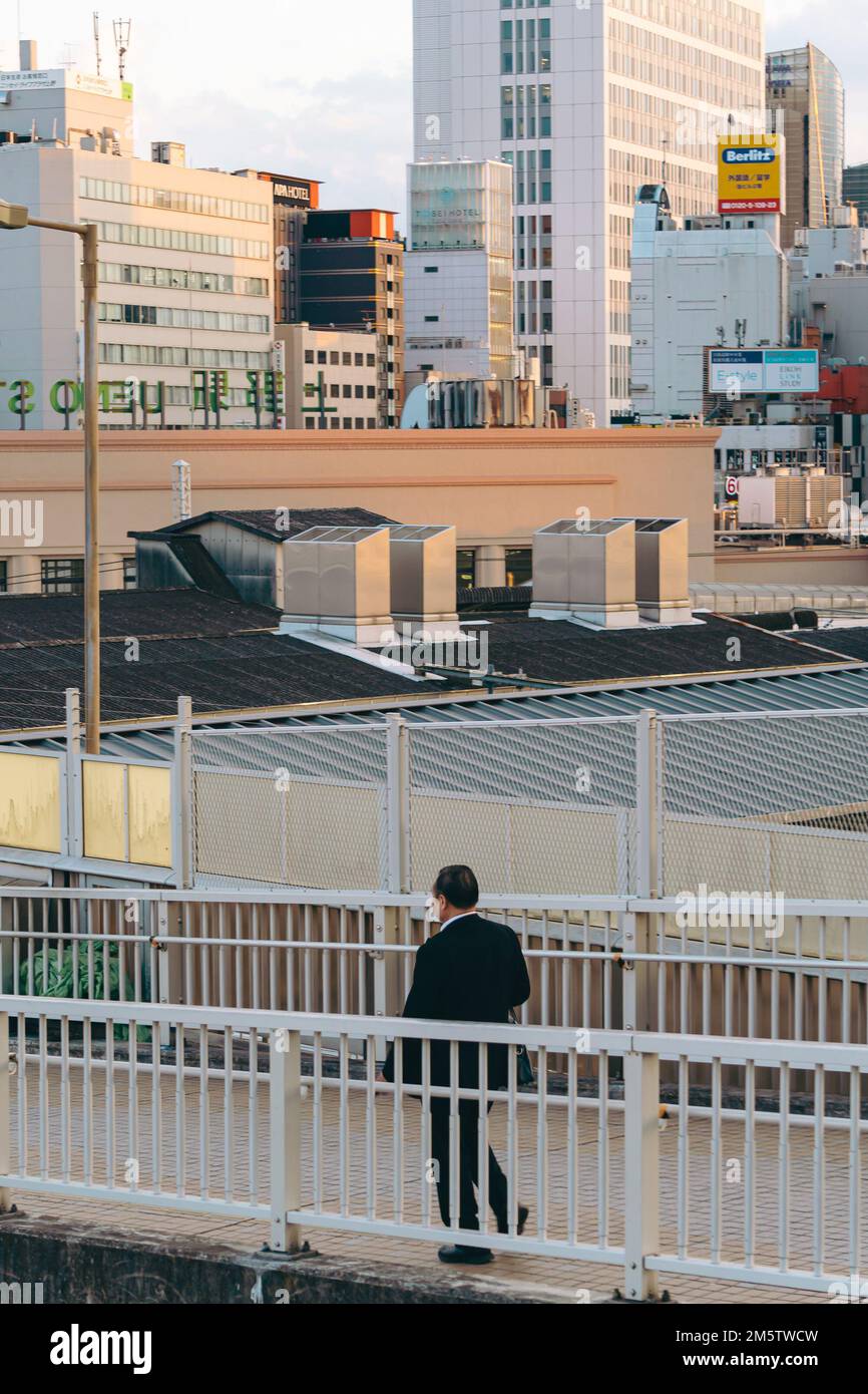 Japanese people and the cityscape of Tokyo Stock Photo - Alamy