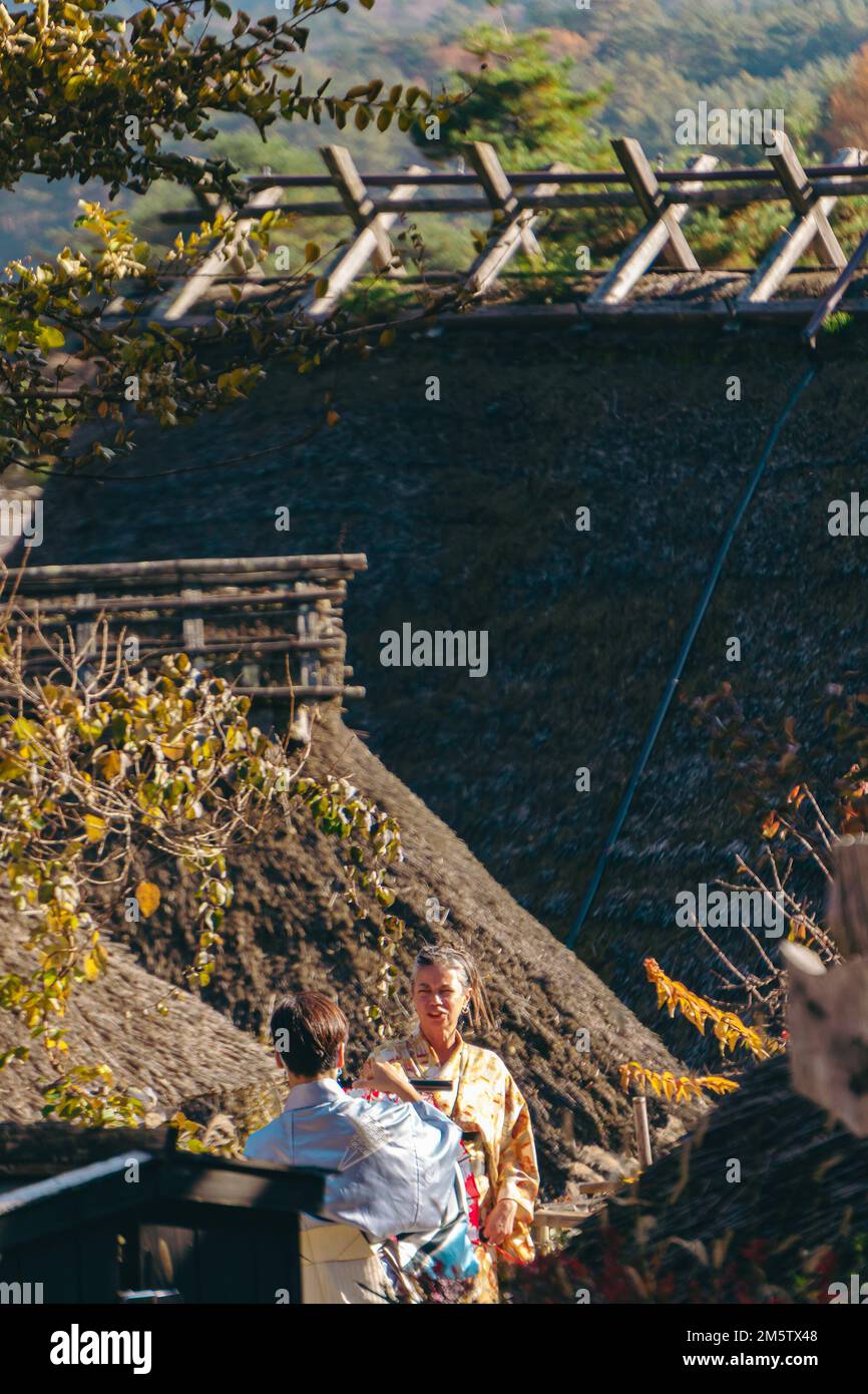 Caucasian tourists in kimono dresses at a rural Japanese village Stock ...