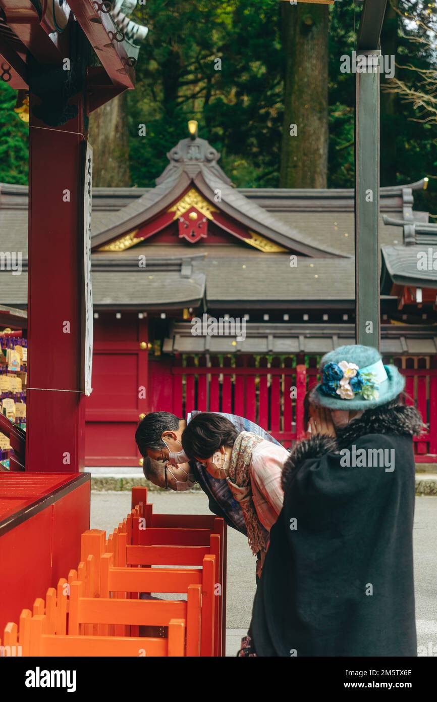 Japanese people praying at a shrine in Hakone Stock Photo - Alamy