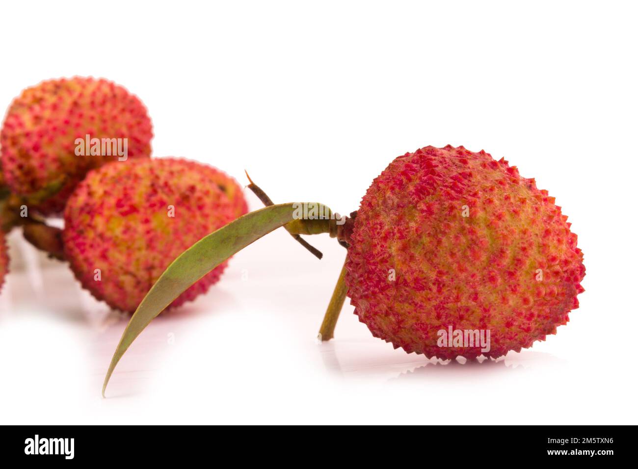 Fresh lychees isolated on white background Stock Photo - Alamy