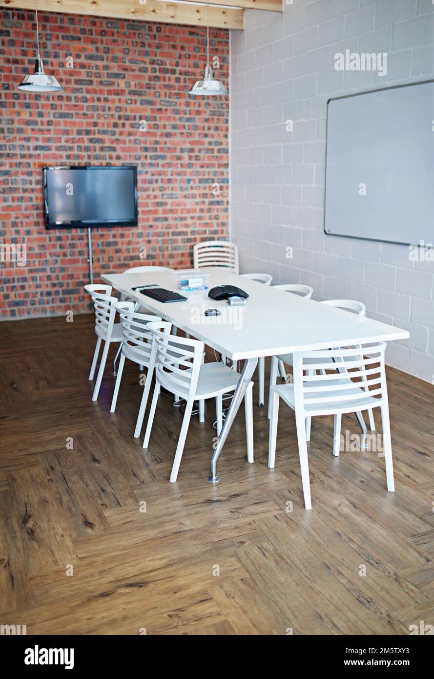 Where success happens. a conference table and chairs in an empty boardroom Stock Photo - Alamy