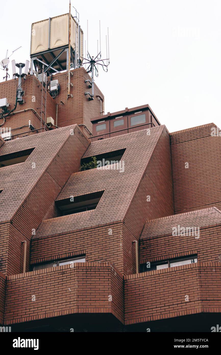 A brutalist brick facade design typical of Japanese retro architecture ...