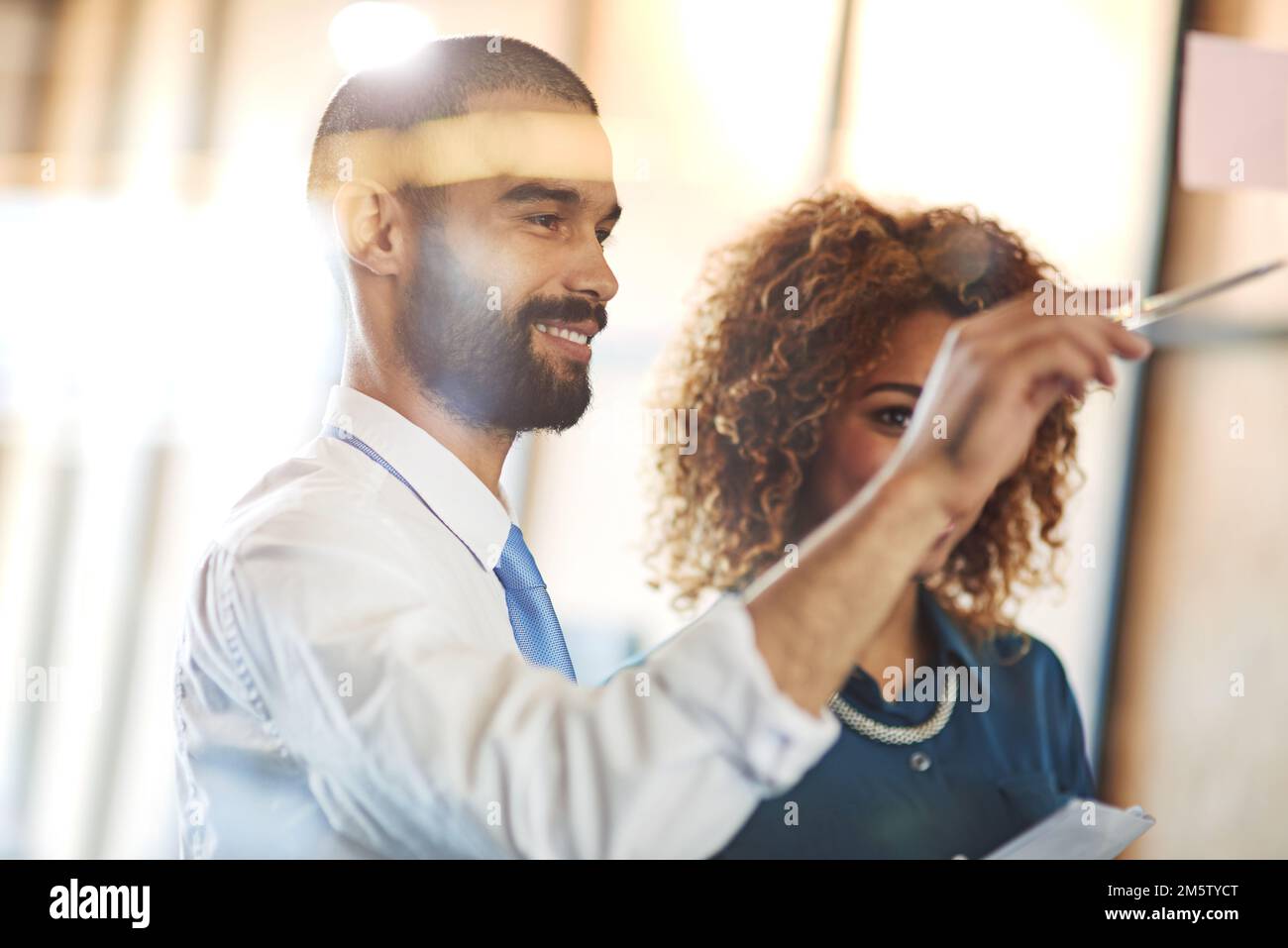 Generating new business strategies. two young professionals ...