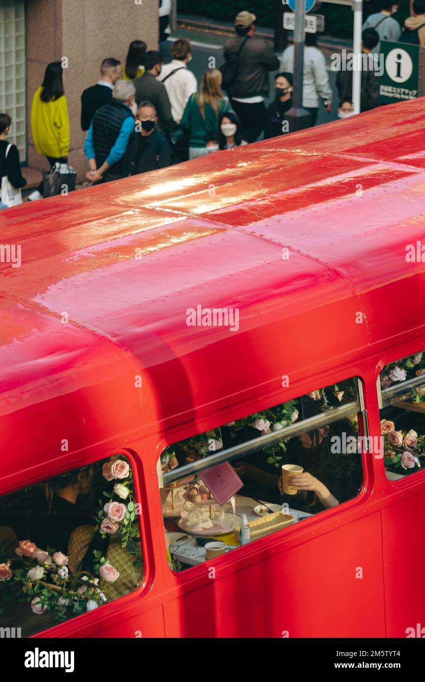 People dining in a city touring bus cafe Stock Photo - Alamy
