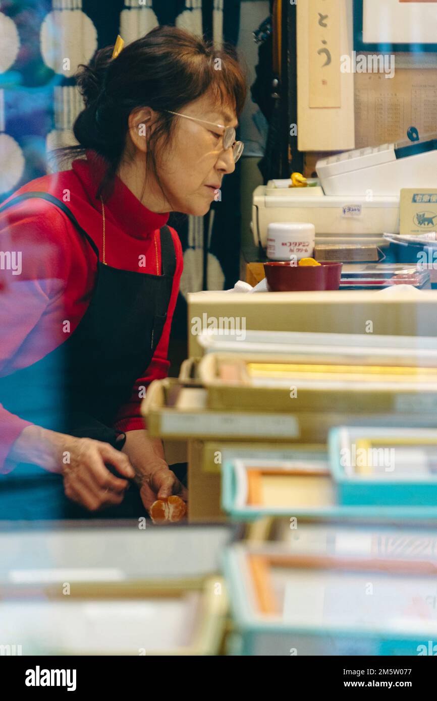 Old bookstore woman hi-res stock photography and images - Alamy