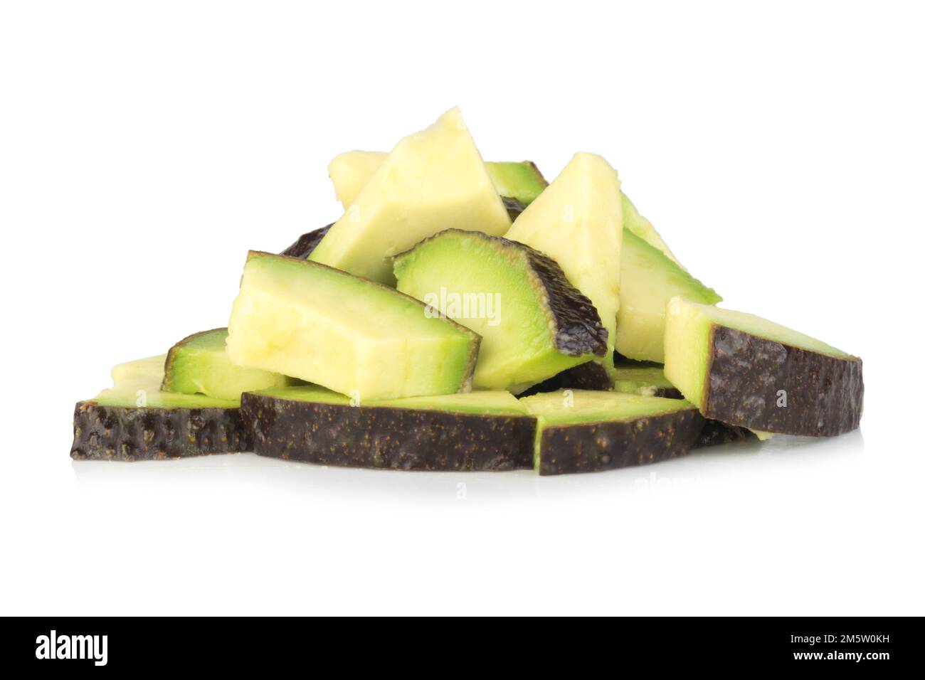 avocado piece pile isolated on white background Stock Photo - Alamy