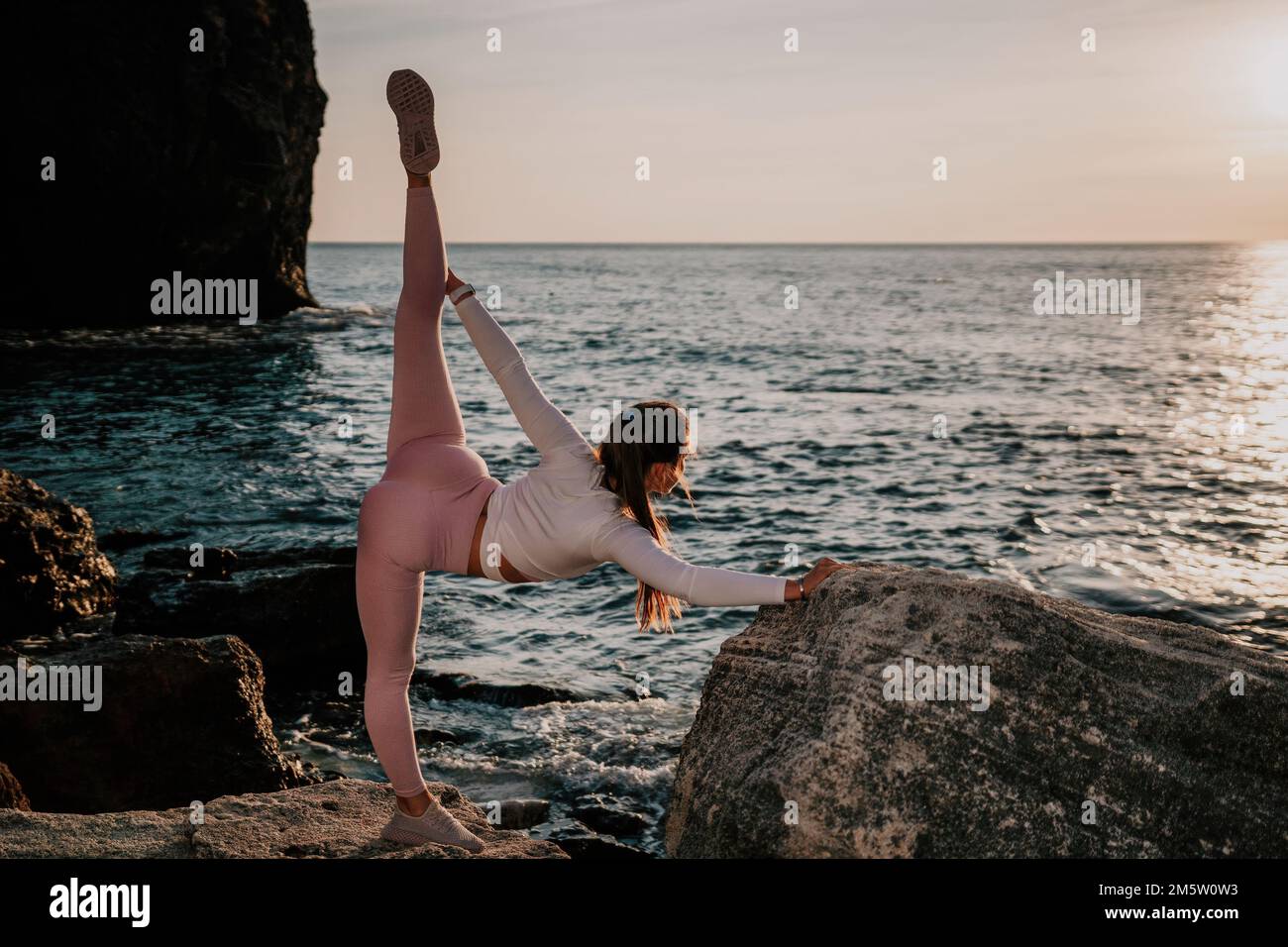 Young woman with black hair, fitness instructor in pink leggings Stock ...