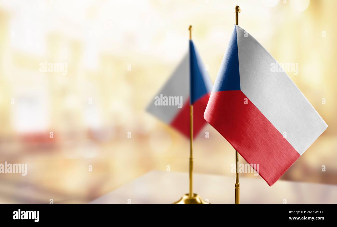 Small flags of the Czechia on an abstract blurry background Stock Photo ...