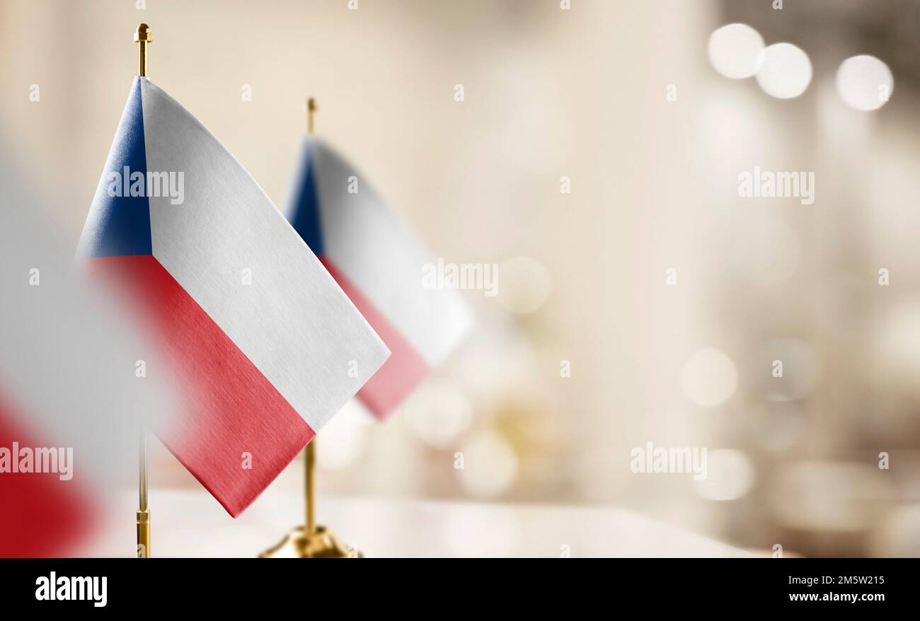 Small flags of the Czechia on an abstract blurry background Stock Photo ...