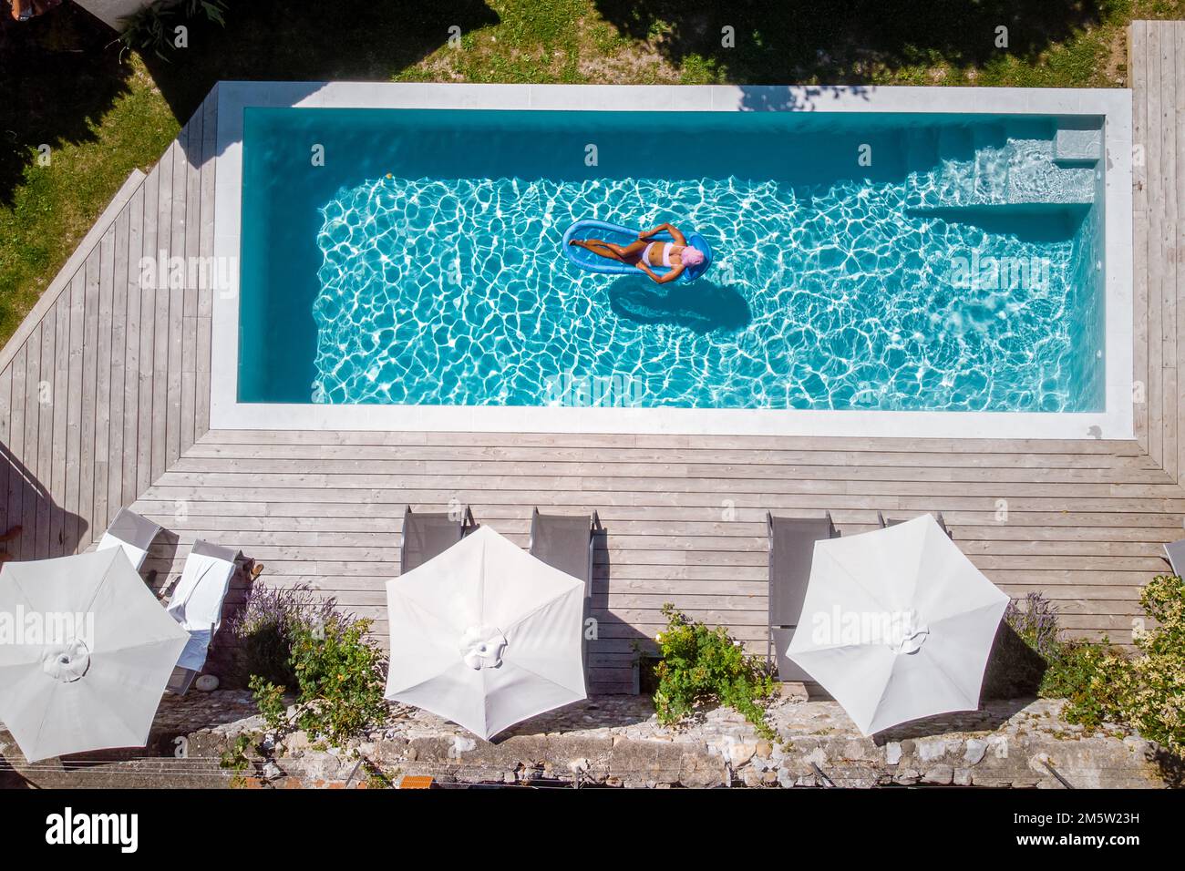 Woman home pool top view hi-res stock photography and images - Alamy