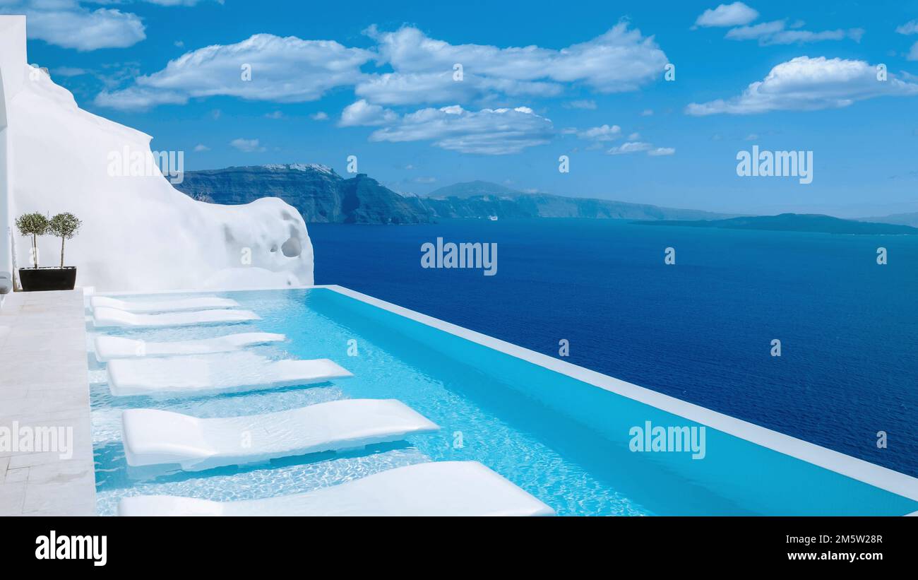 Infinity pool Santorini Greece looking out over the caldera of the ...