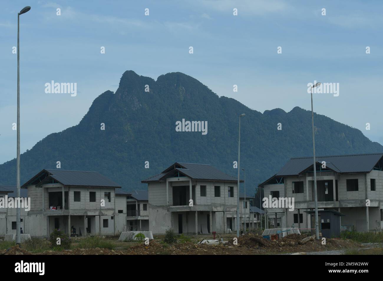 A housing development project with Mountain Santubong as backdrop in ...
